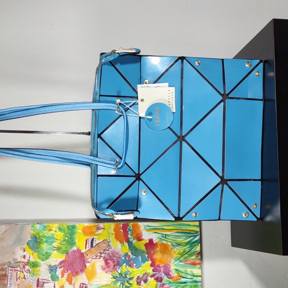 Isabelle Handbag | Bags | Isabelle Handbag Pvc Geometric Puzzle Tote ...